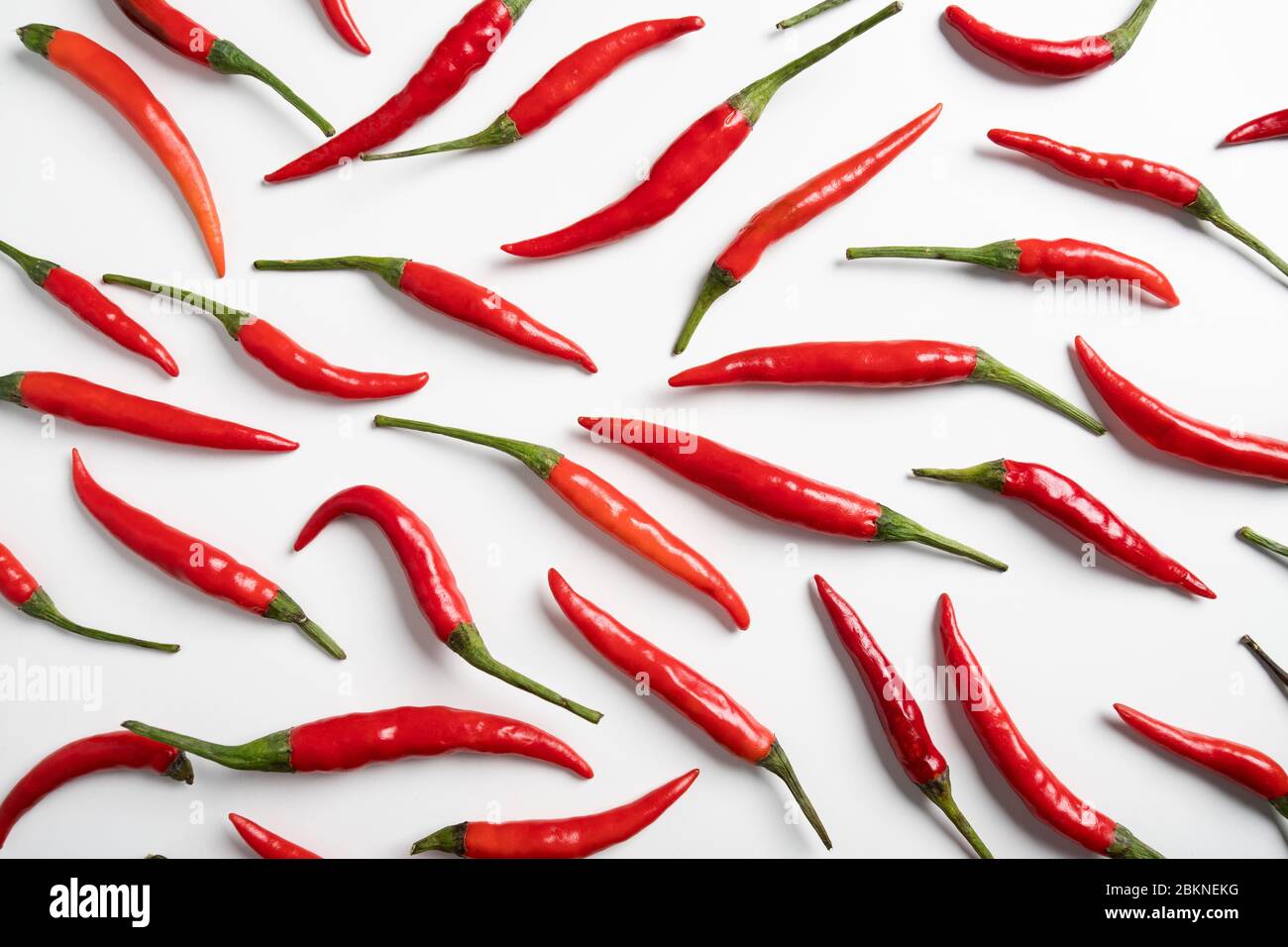 Red hot little chili peppers pattern on white background. Top view ...