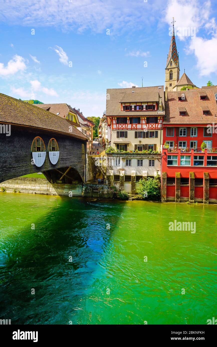 Baden old town and the covered wooden bridge over Limmat river ...