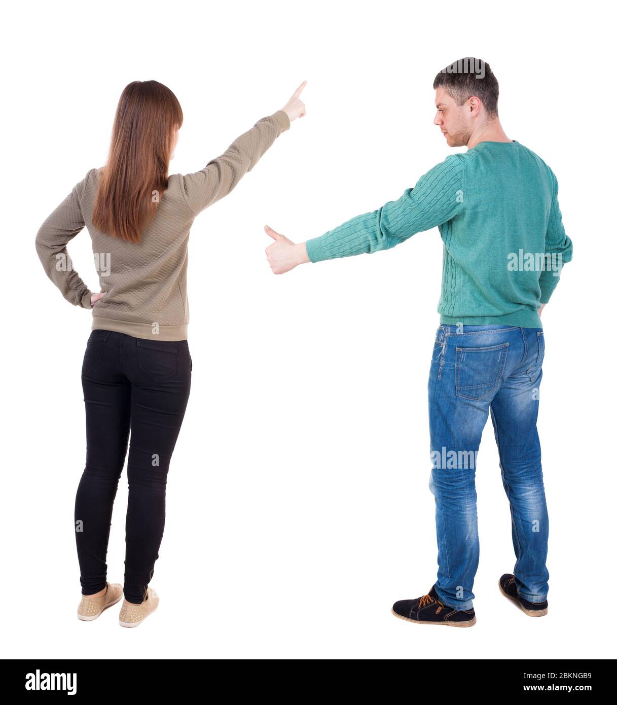Back view of couple in sweater pointing. Rear view people collection ...