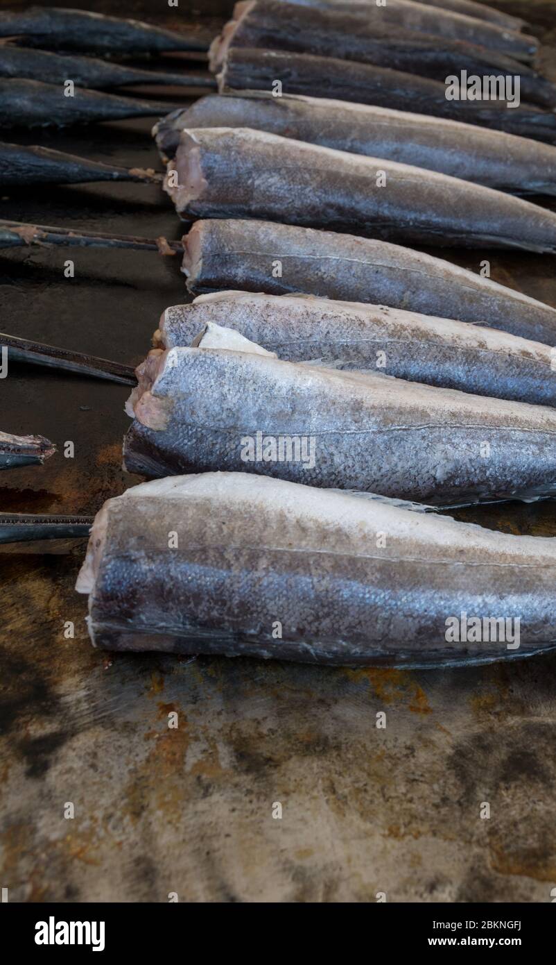 Fresh raw fish on grill slate, during seafood festival, street food ...
