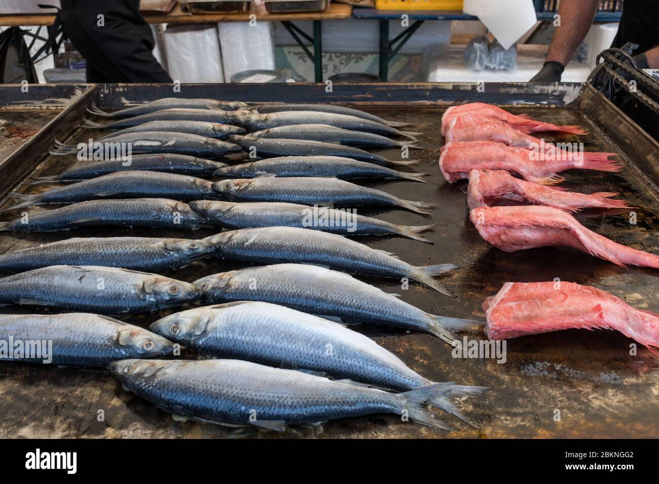 Fresh raw fish on grill slate, during seafood festival, street food ...