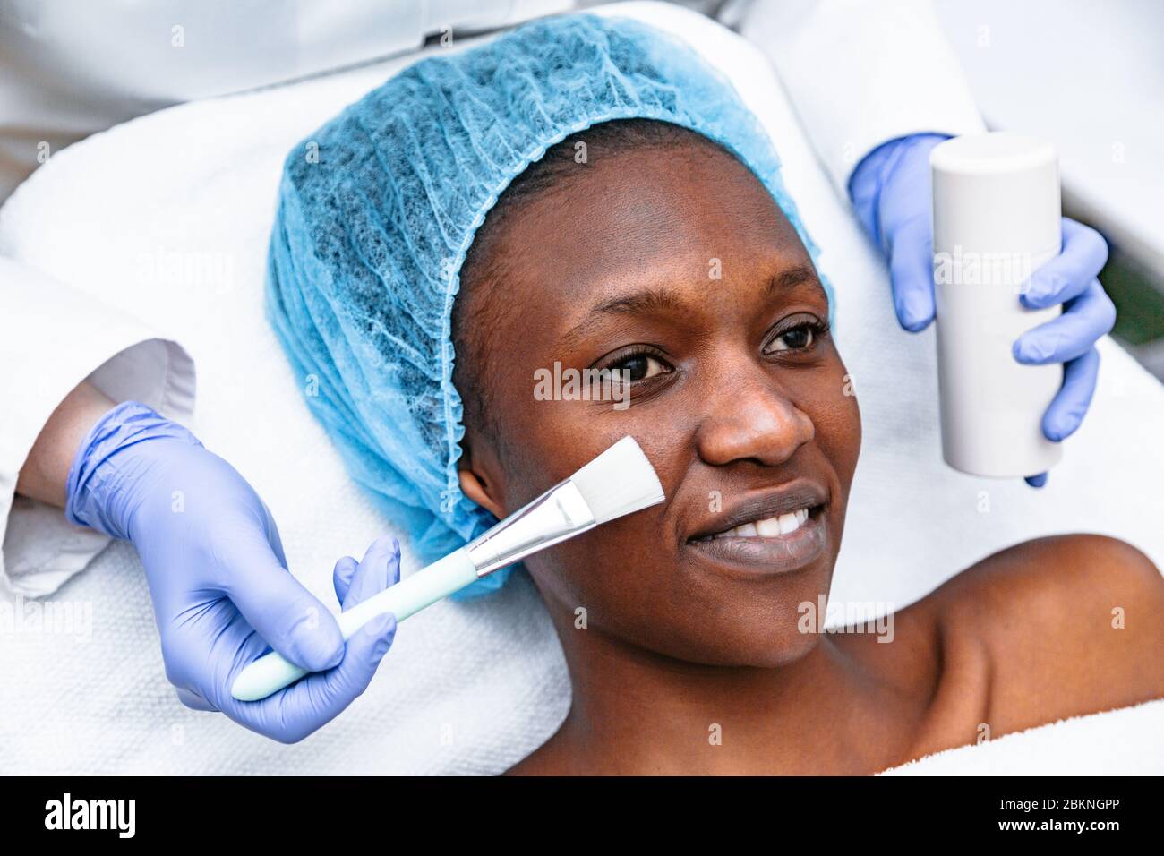 African american female doctor applying hi-res stock photography and ...