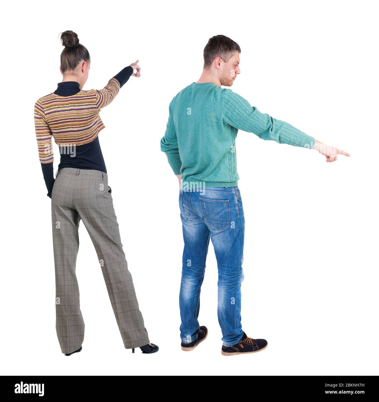 Back view of couple in sweater pointing. Rear view people collection ...