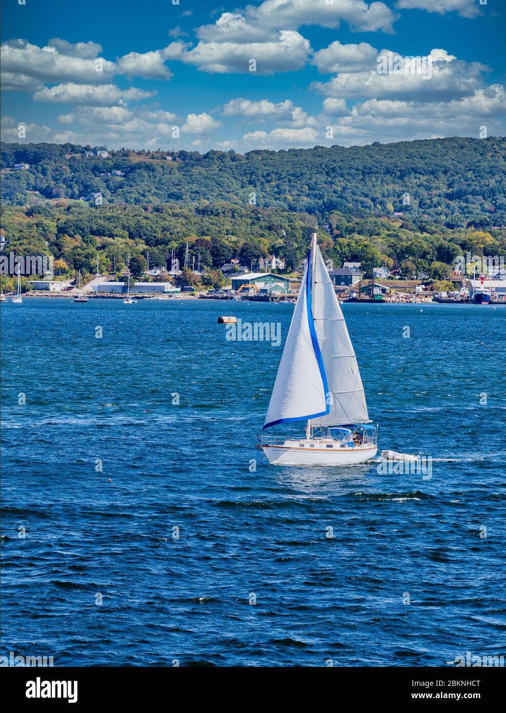 Fishing boat blue sail hi-res stock photography and images - Alamy