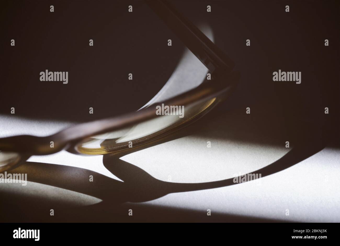 glasses and shadows Stock Photo - Alamy