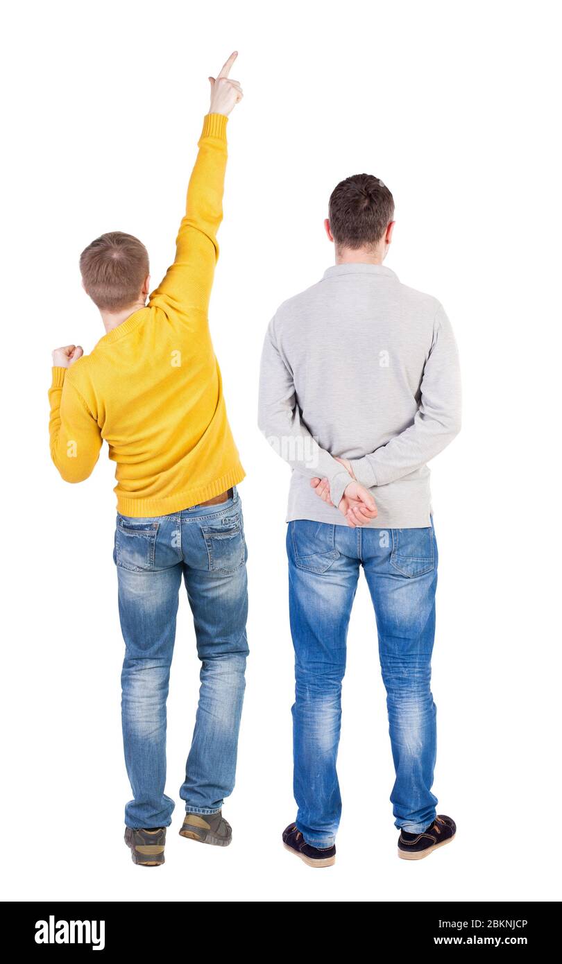 Back view of two man in sweater pointing. Rear view people collection ...