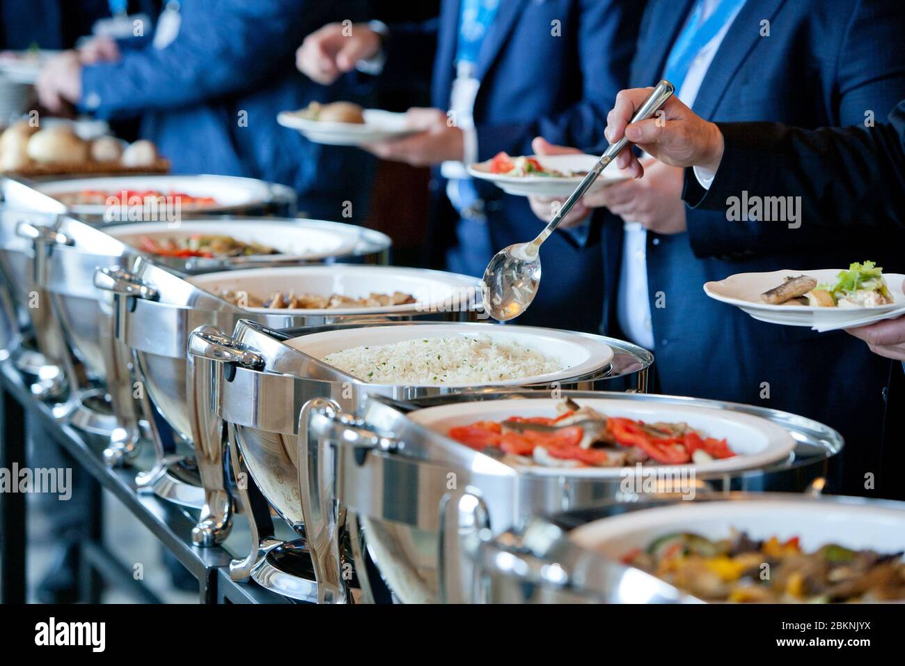 Men in suits dining hi-res stock photography and images - Alamy