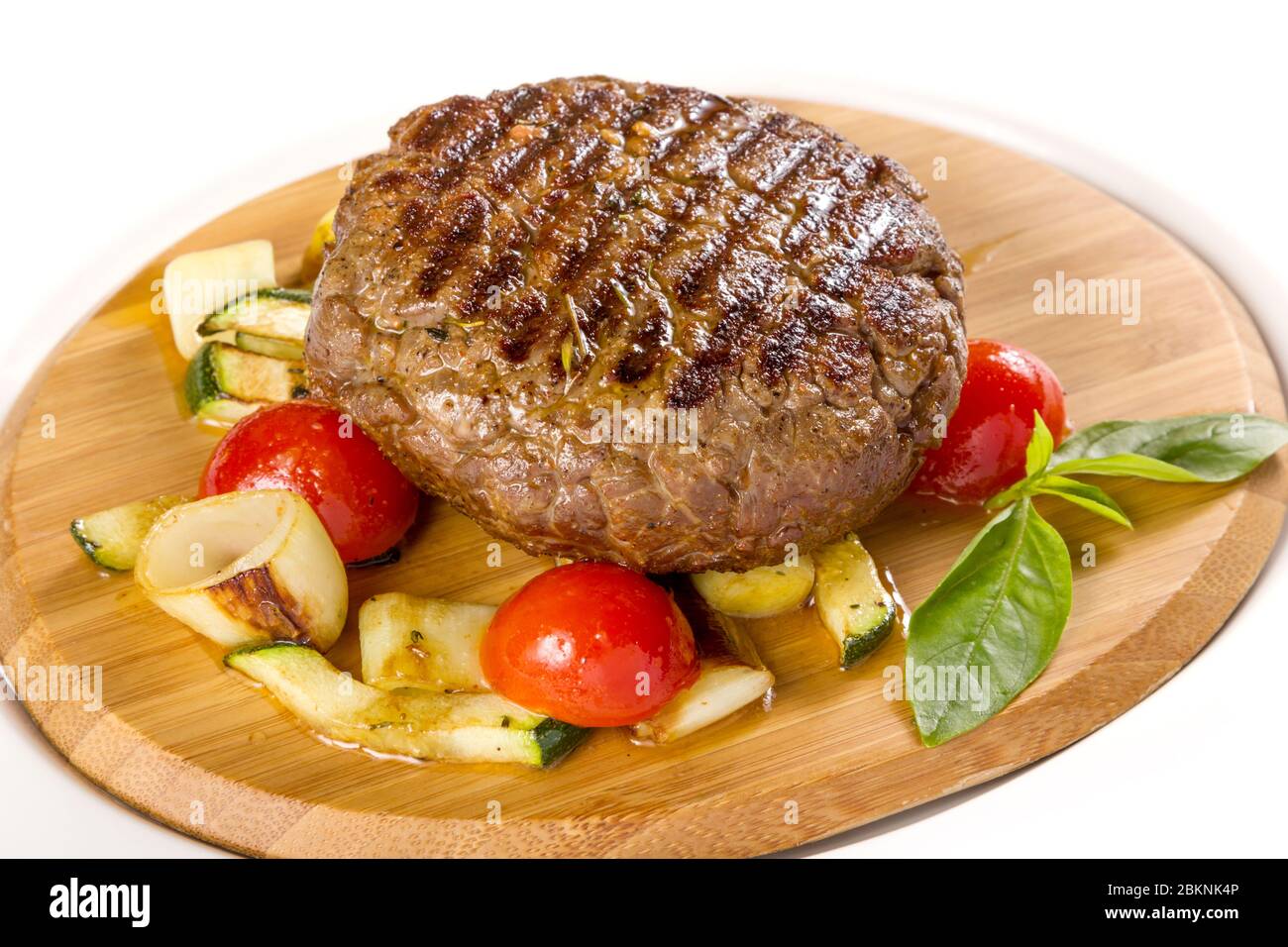 tasty juicy meat well roasted with vegetables Stock Photo - Alamy