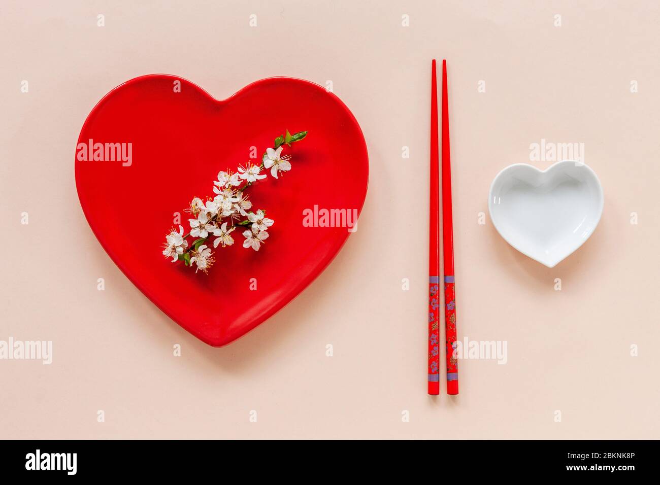 Spring floral Japanese food concept with blooming cherry tree branches ...