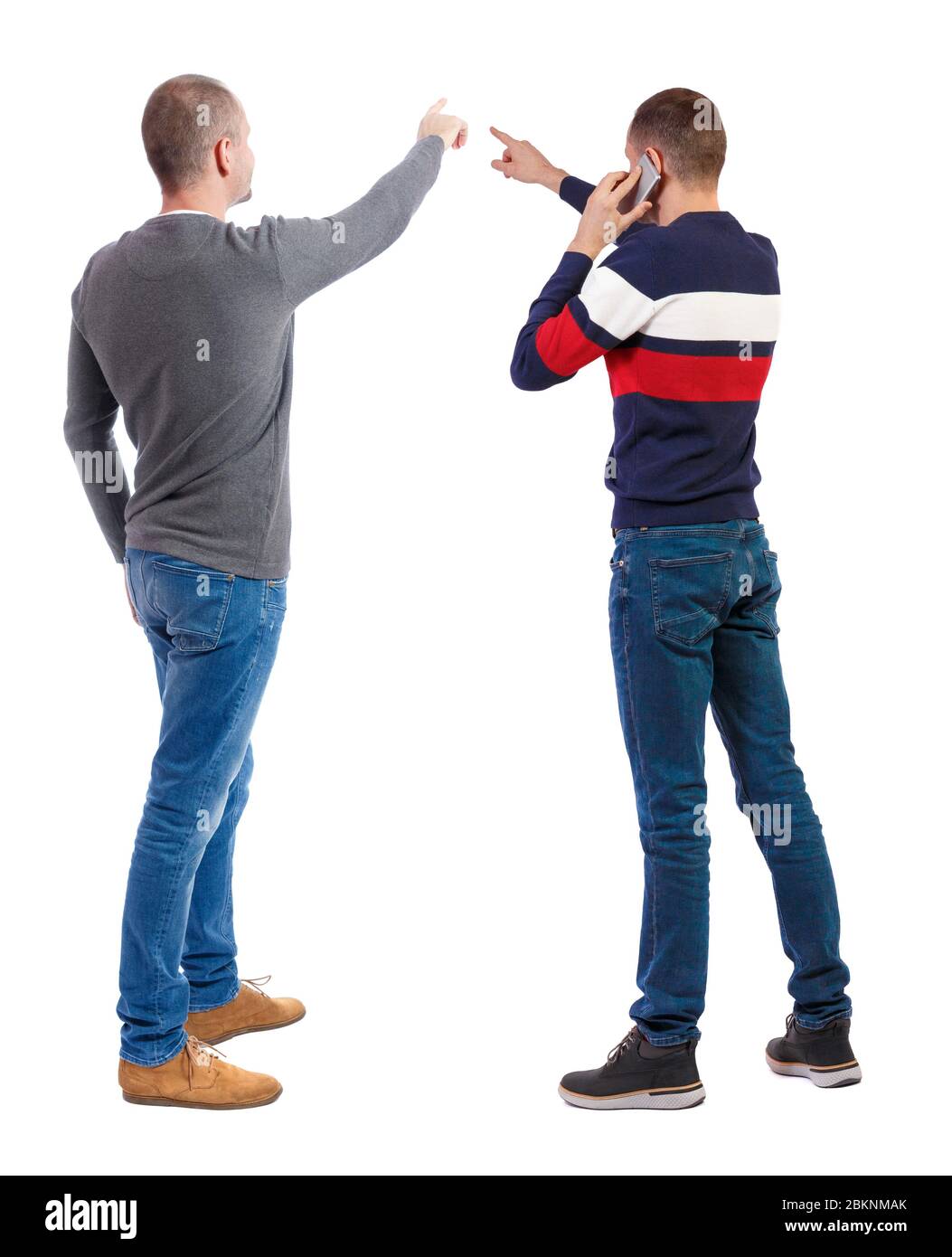 Back view of two man in sweater with mobile phone. Rear view people ...