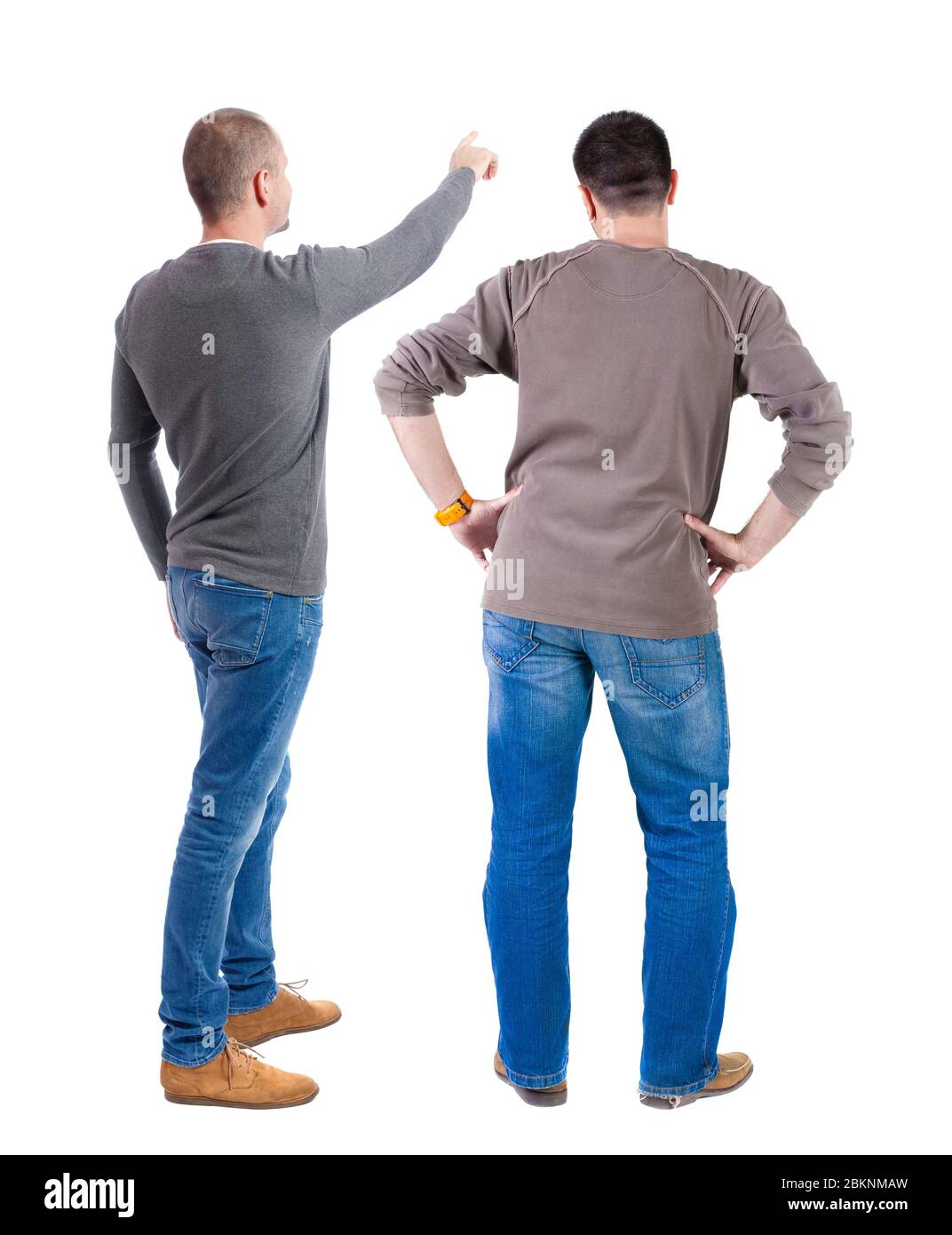 Back view of two man in sweater pointing. Rear view people collection ...