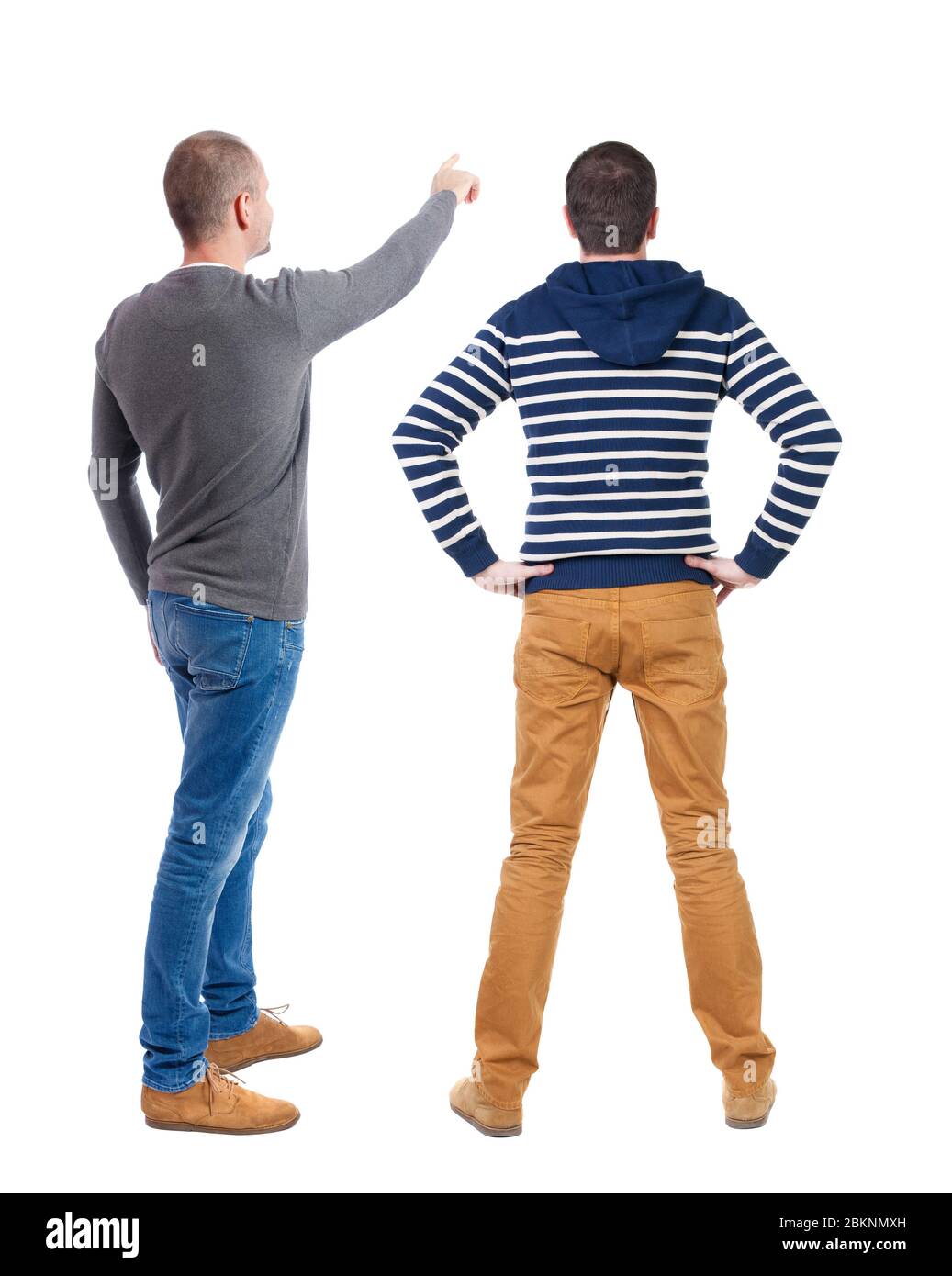 Back view of two man in sweater pointing. Rear view people collection ...