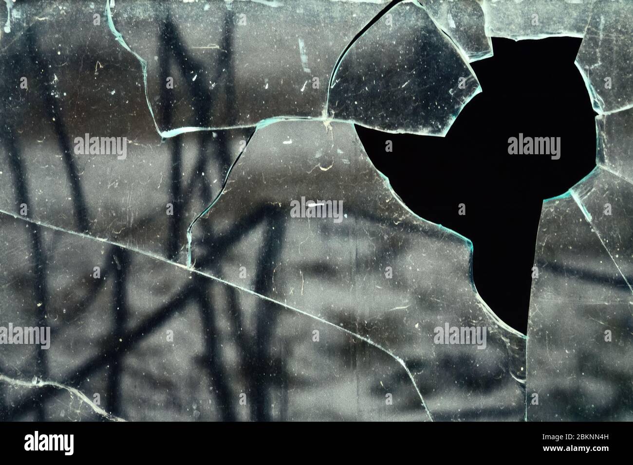 Gloomy broken glass in house. Symbol of unrest and turbulent atmosphere ...