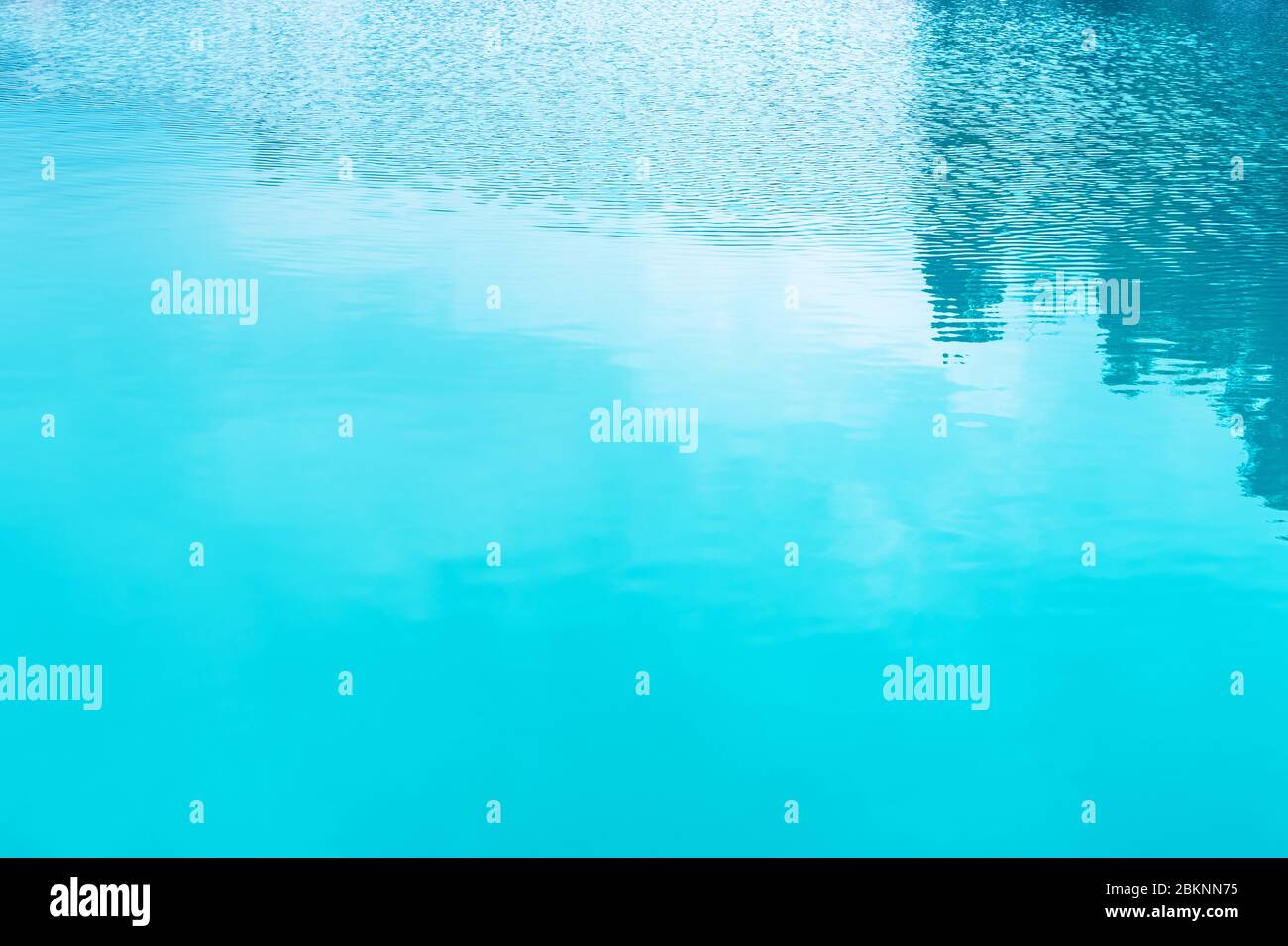 Blue swimming pool water as background with reflections Stock Photo - Alamy