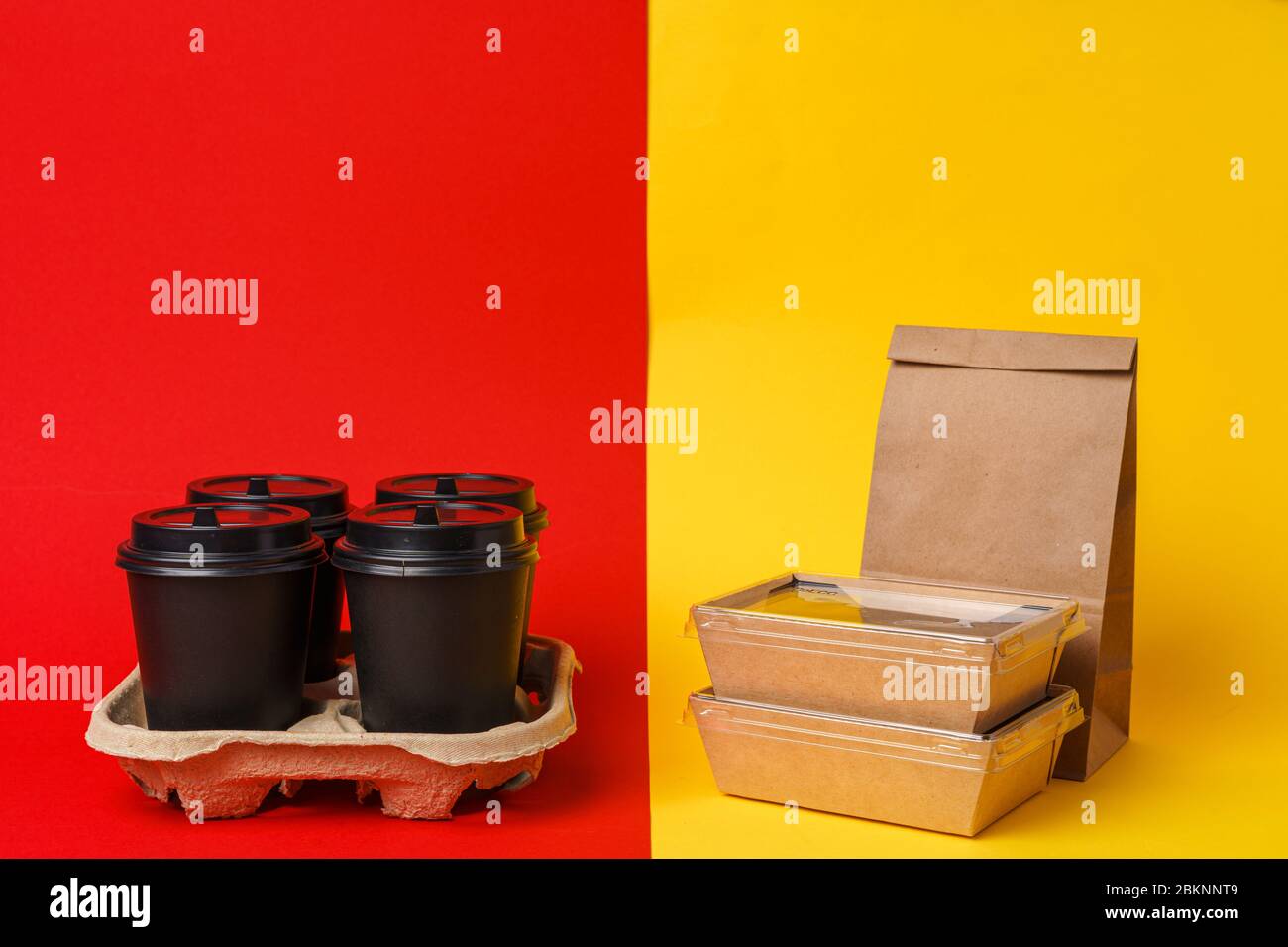 Coffee cups and takeaway food package. Takeout meal Stock Photo - Alamy