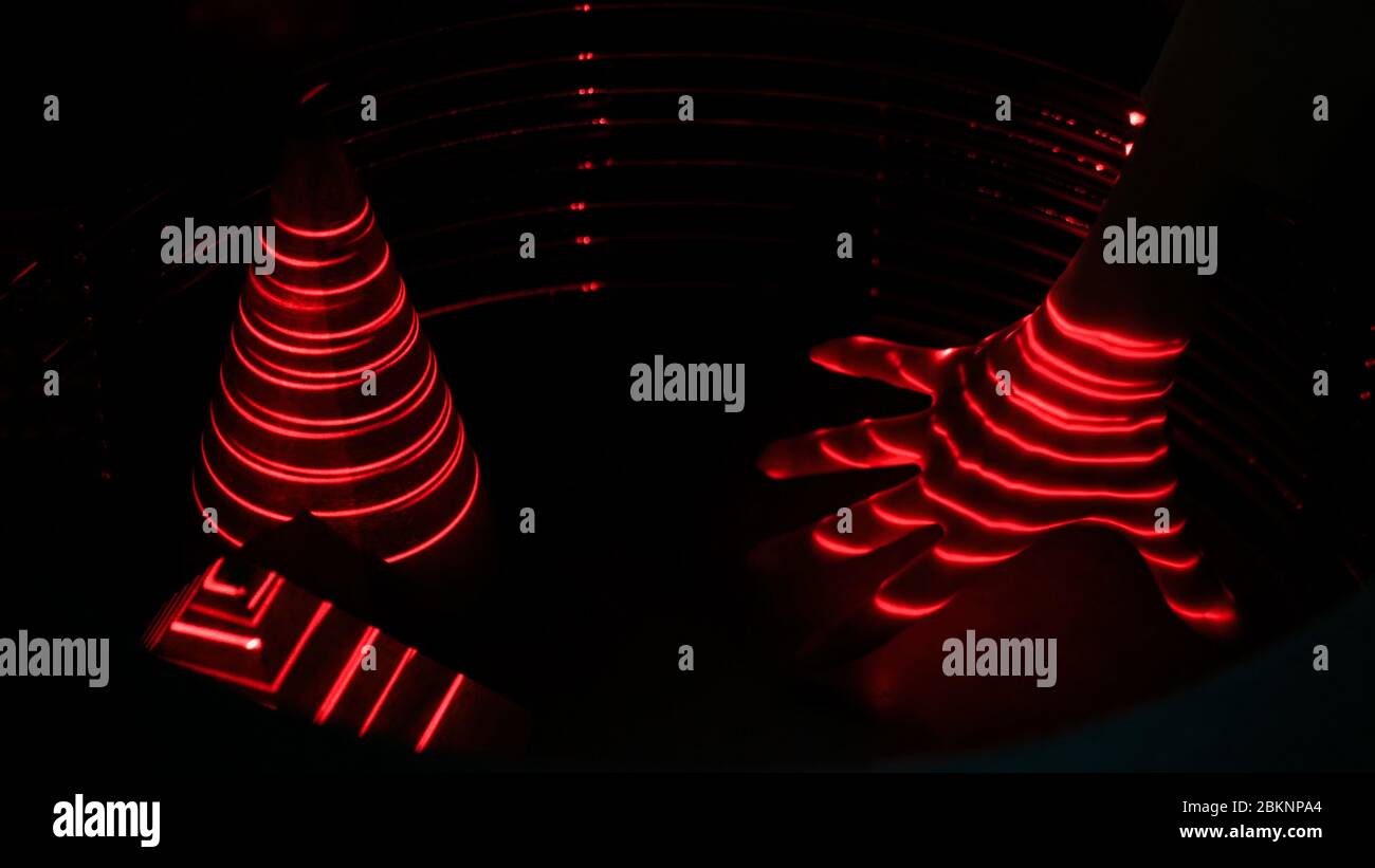 Interactive exposition in science museum - optical illusion with red ...