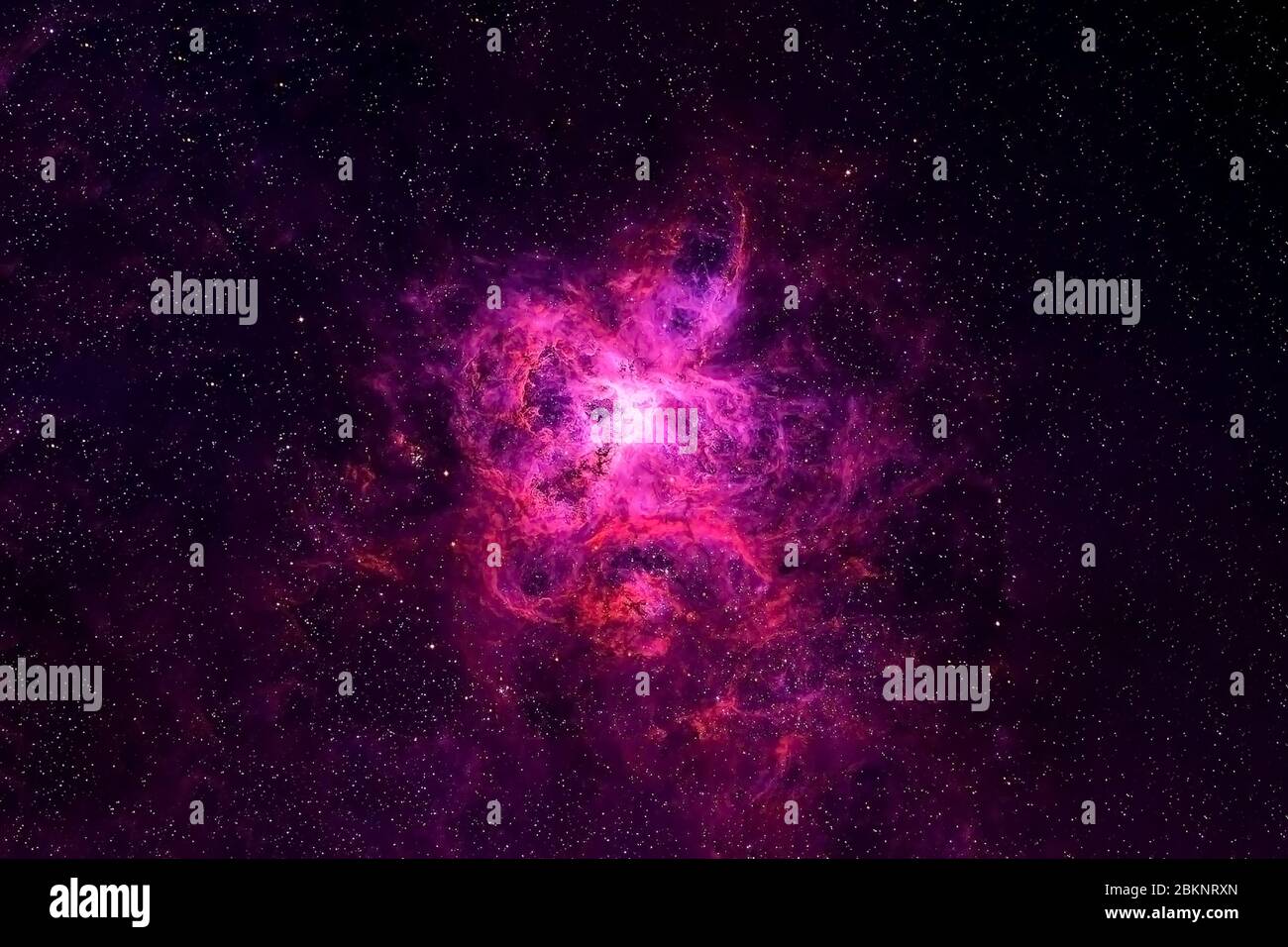 A pink galaxy in deep space. Elements of this image were furnished by ...