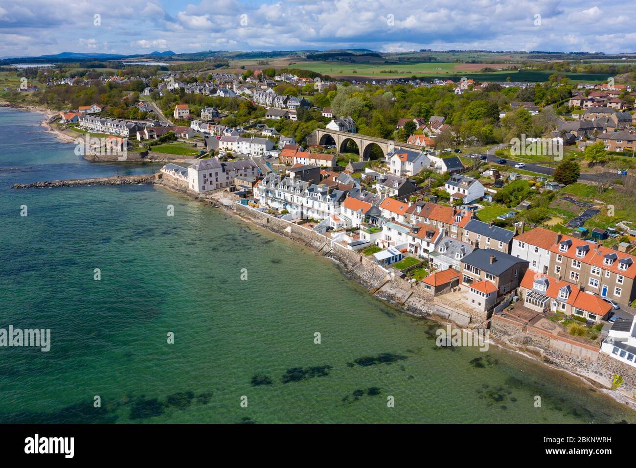 Aerial view of village of Lower Largo in Fife, during covid-19 lockdown ...