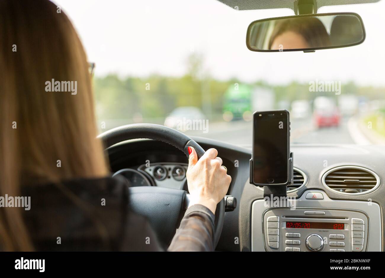 Car behind road hi-res stock photography and images - Alamy