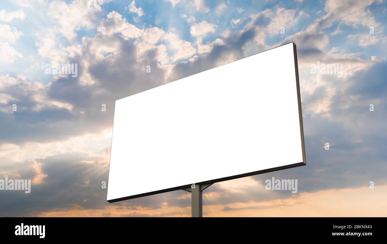 Mock up image: blank white billboard or large display with sun beams ...