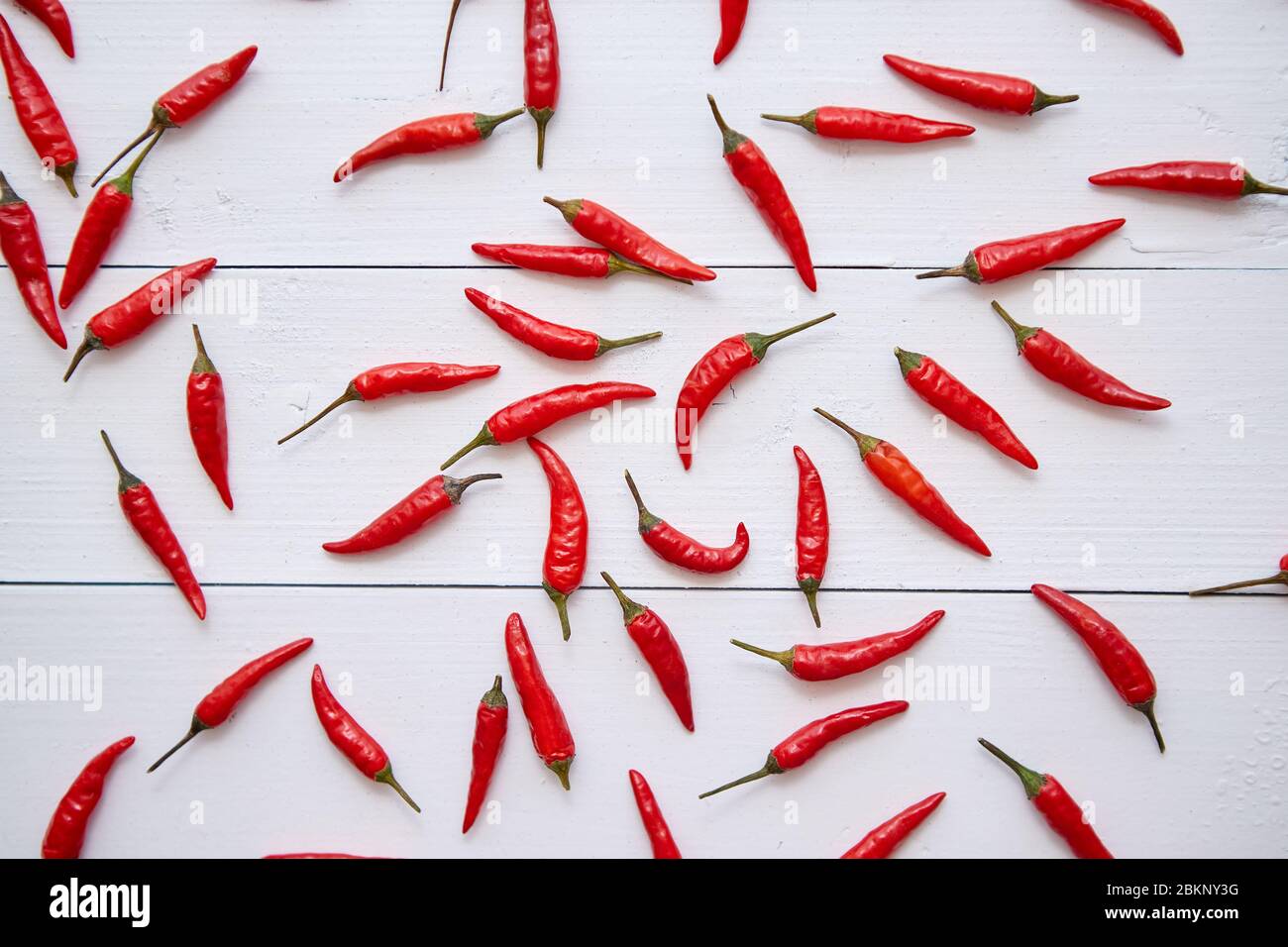 Red hot little chili peppers pattern isolated on white Stock Photo - Alamy