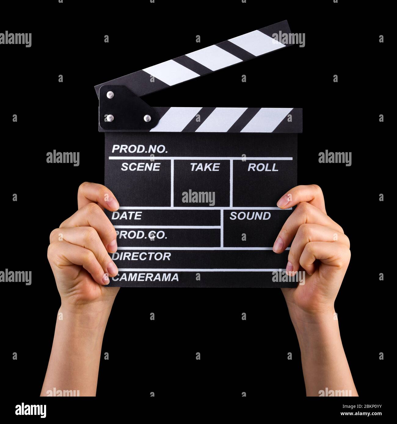 Human hand holding film clapper board isolated on black background ...