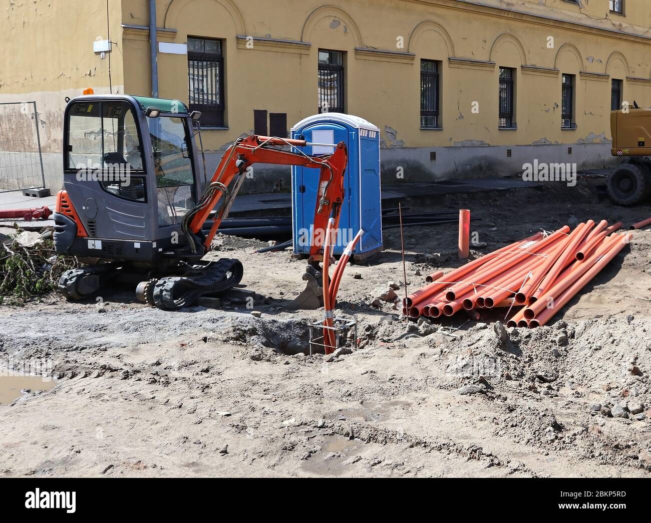 Front end loader at the road construction Stock Photo - Alamy