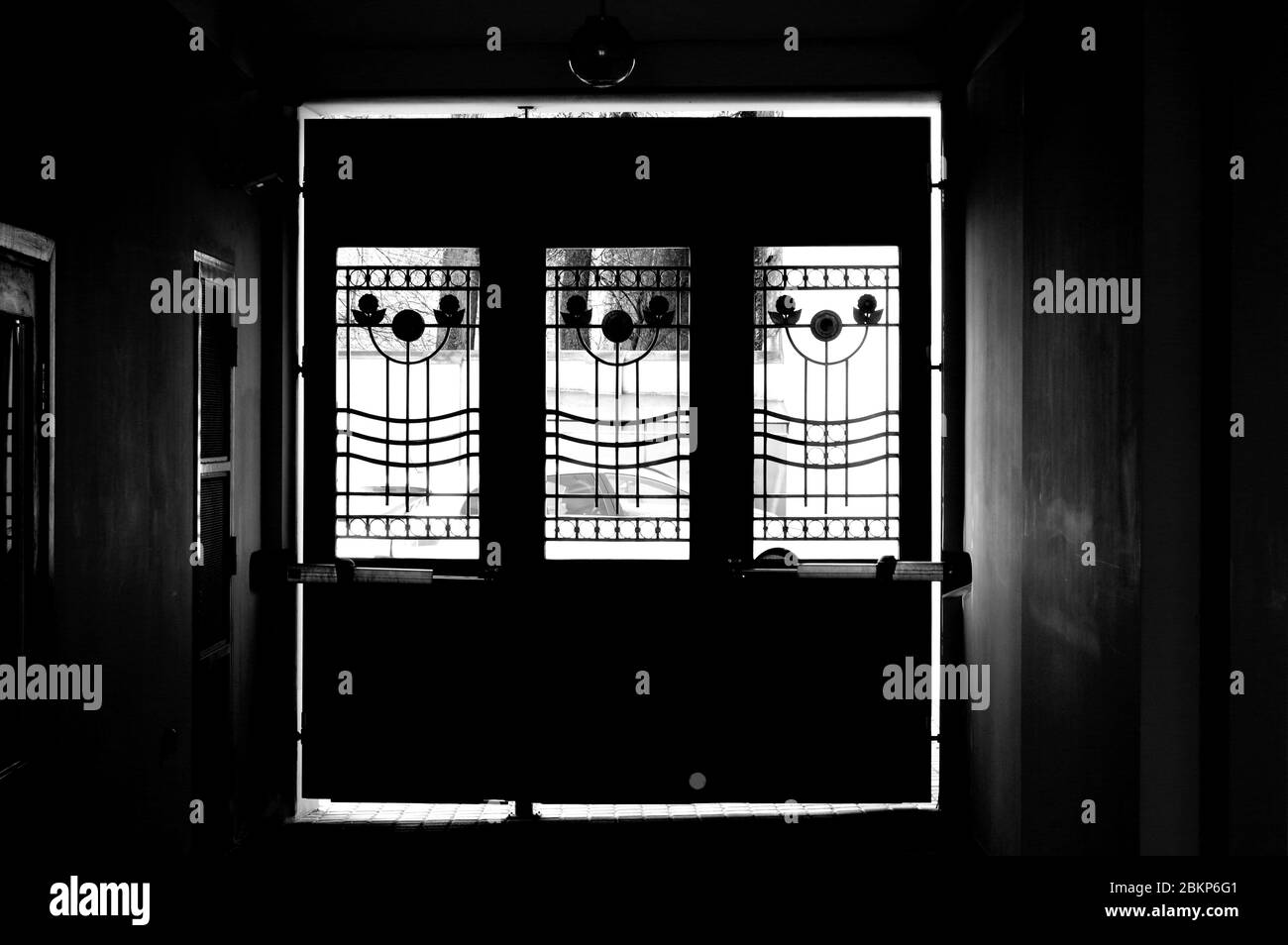 Forged gate gate house Black and White Stock Photos & Images - Alamy