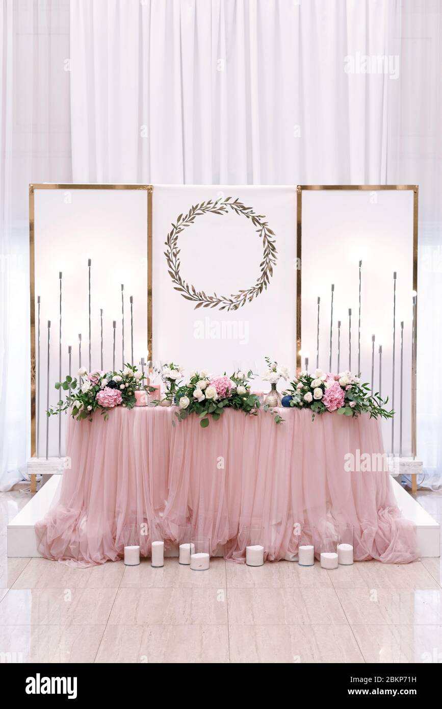 Wedding floral table decoration on white background Stock Photo - Alamy