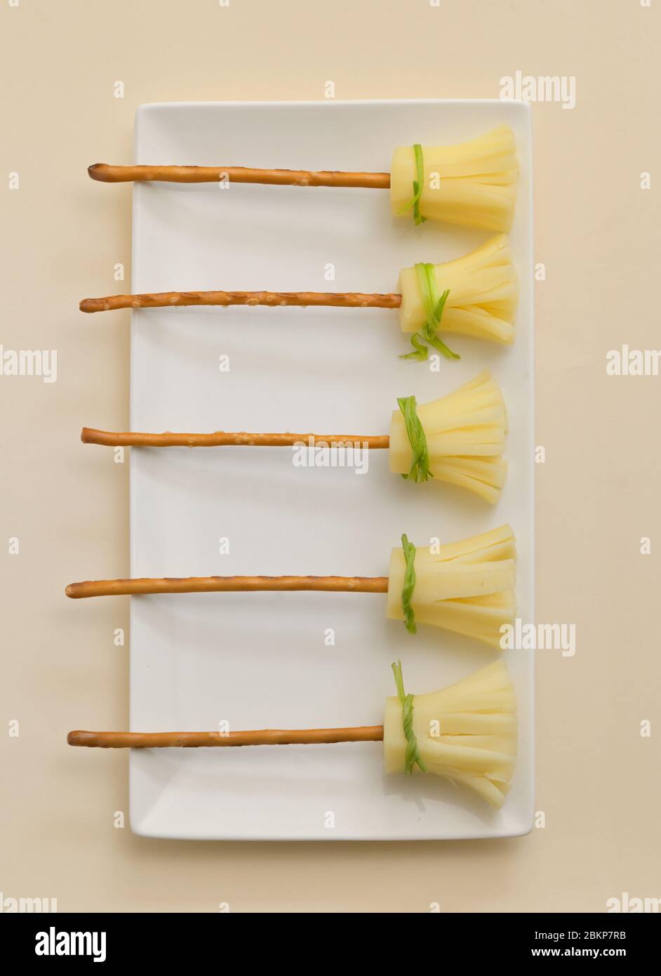 Snack Cheese and Salt Sticks Broomsticks on Plate Stock Photo - Alamy