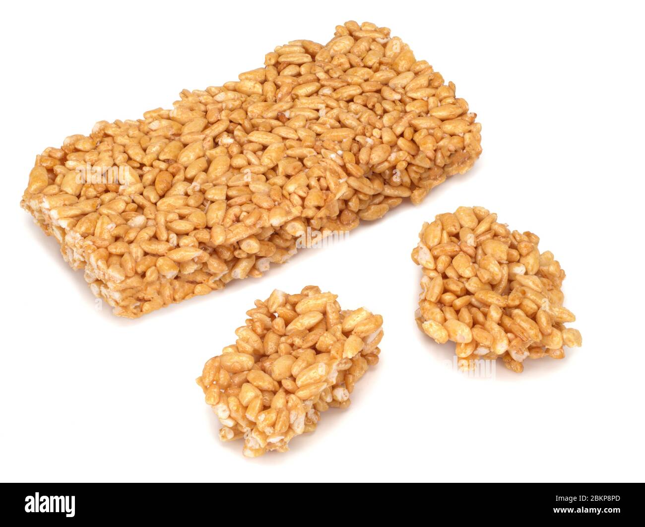 pressed sweet puffed rice on white background Stock Photo - Alamy