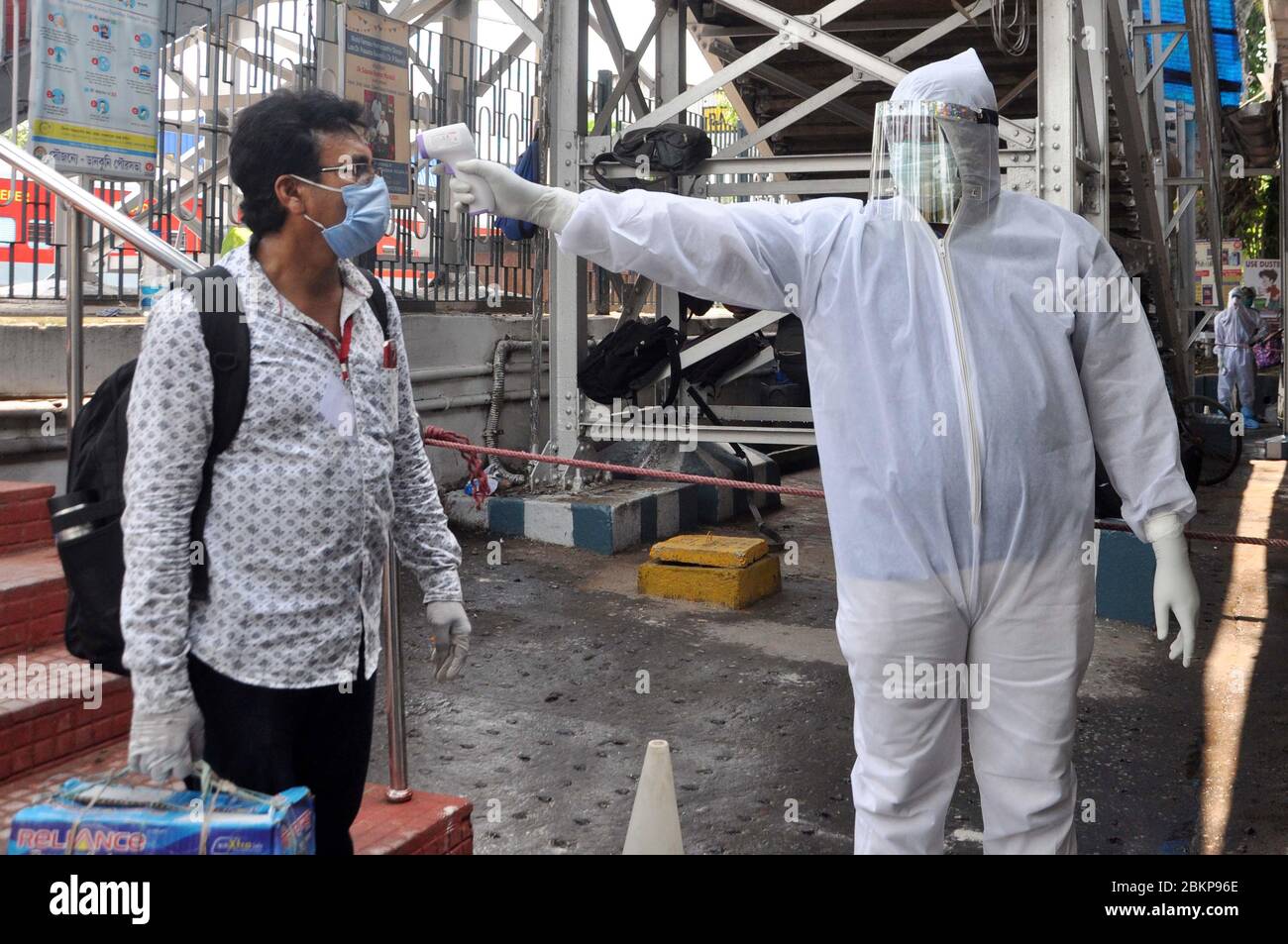 Dankuni, India. 05th May, 2020. Health worker take thermal check up of ...