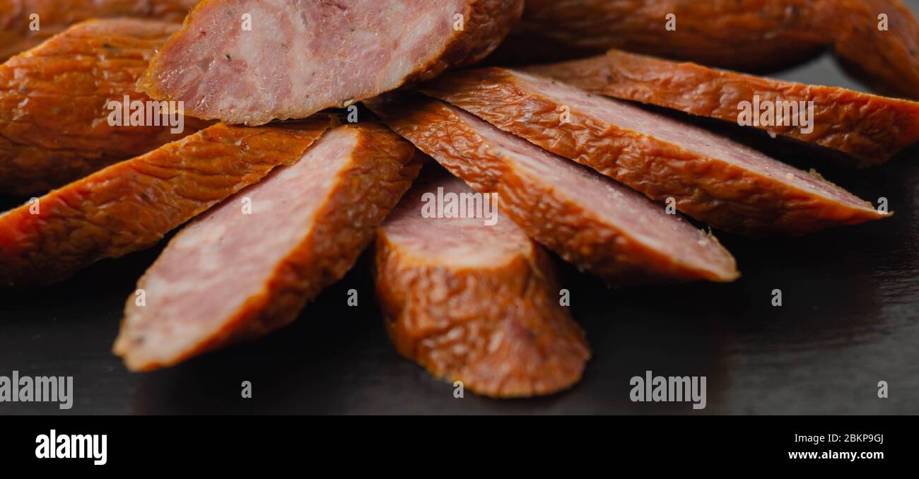 Traditional Polish sausage cut into slices, typical delicatessen ...