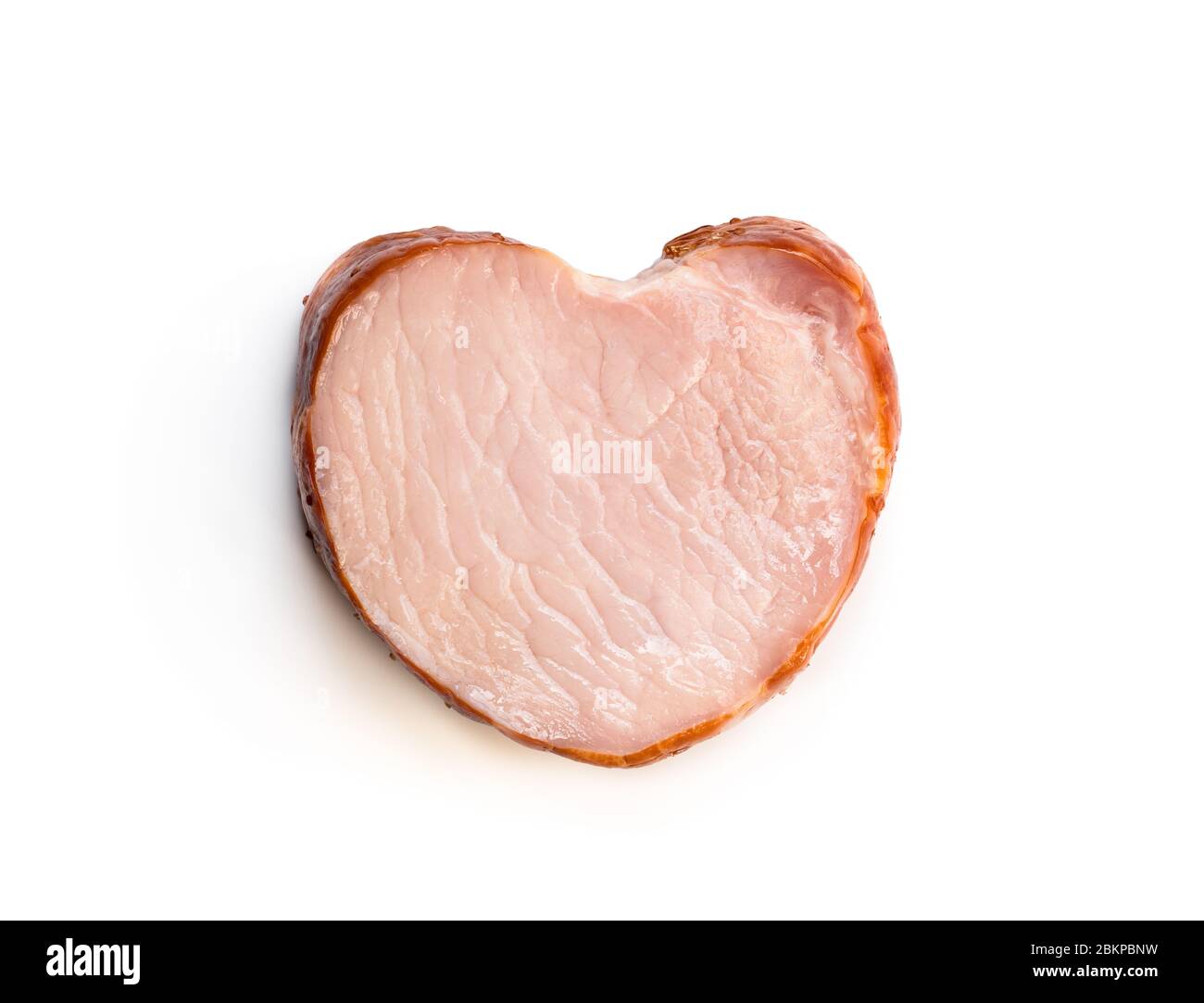 Heart shaped smoked pork loin isolated on white Stock Photo - Alamy
