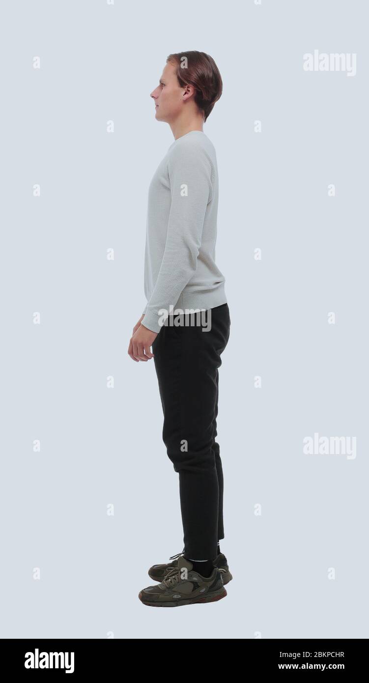 side view. stylish young man looking forward Stock Photo - Alamy