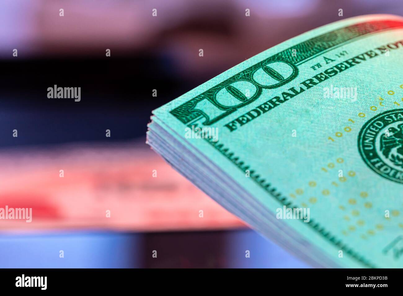 money background from dollars in neon light, close up Stock Photo - Alamy