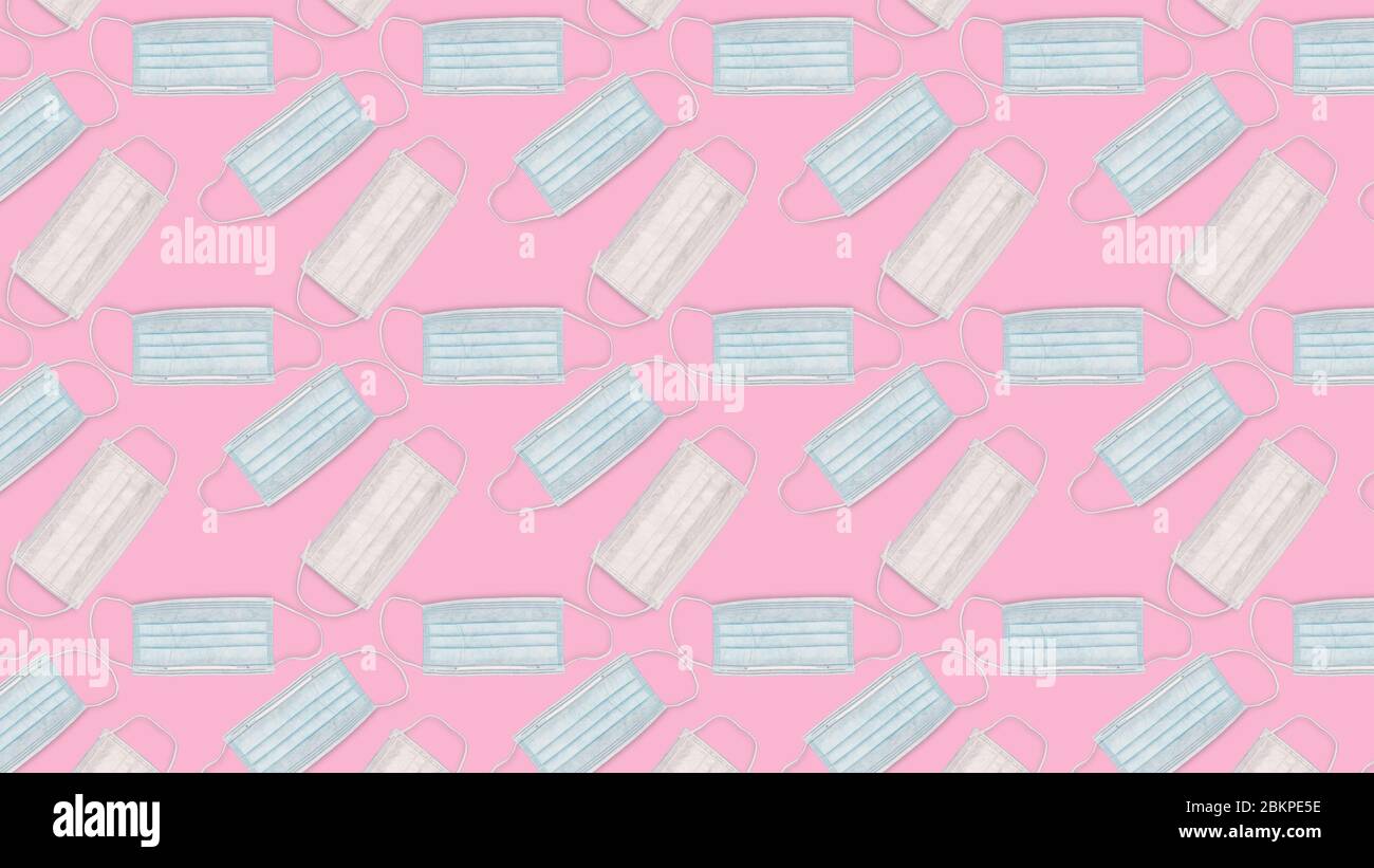 Surgical face mask pattern on pink background Stock Photo - Alamy