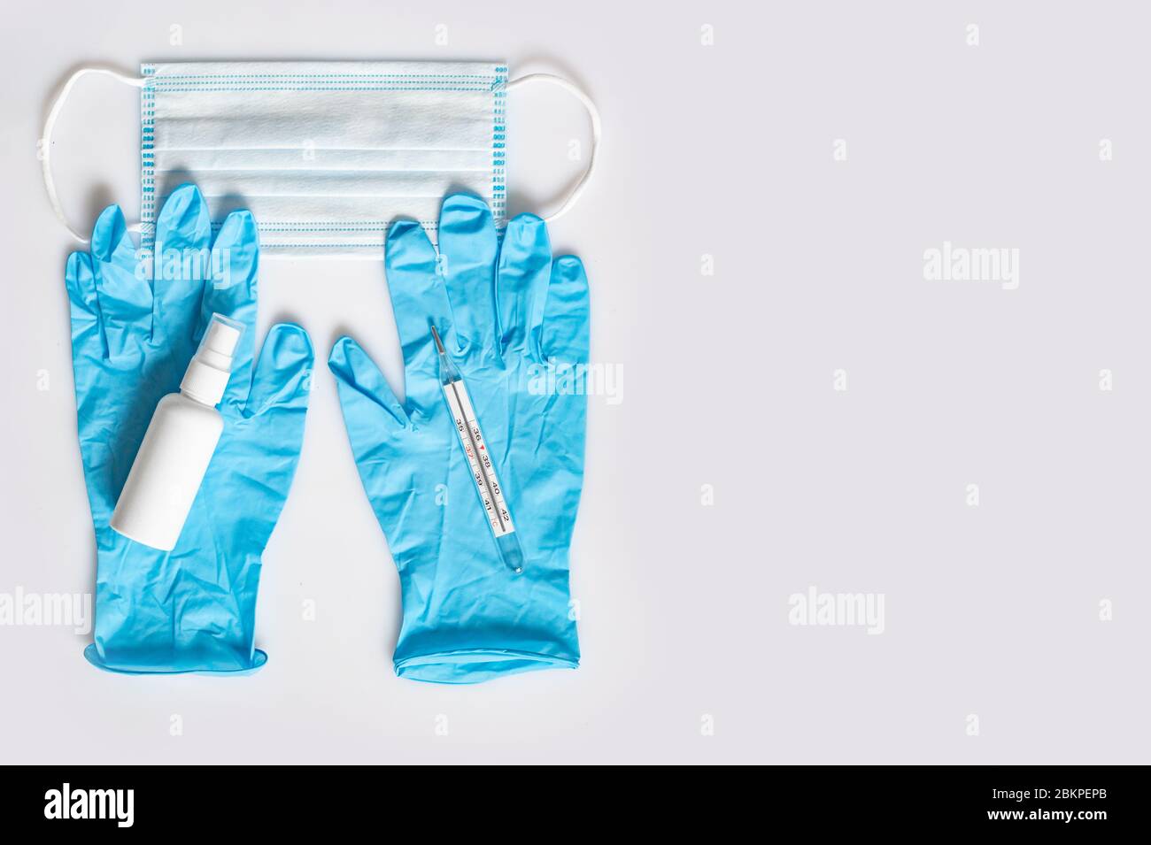 Individual protection means. Gloves, protectiv mask, thermometer and ...