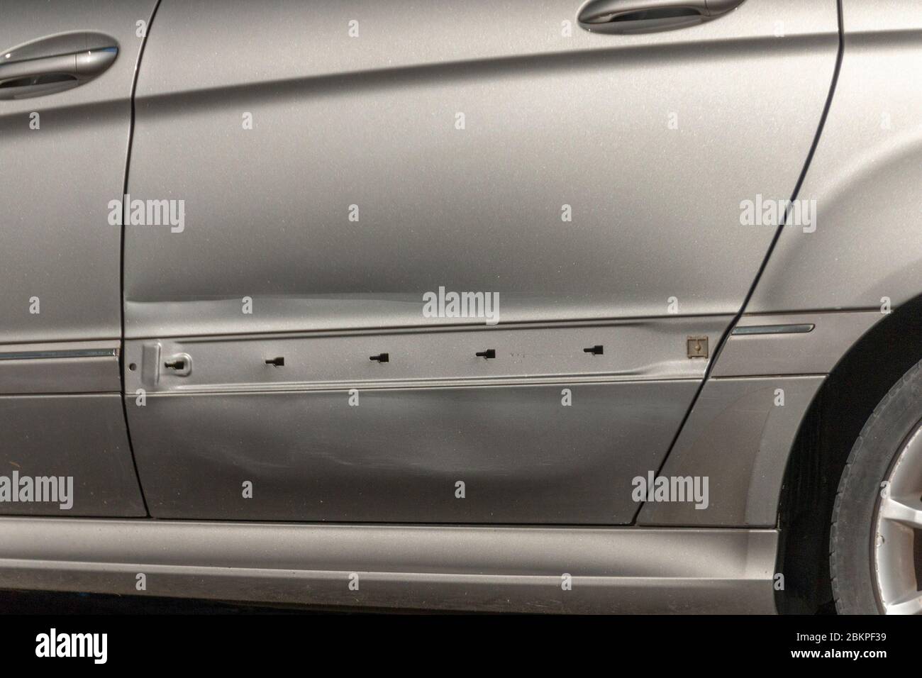 a close up view of a car door with the side panel missing Stock Photo ...