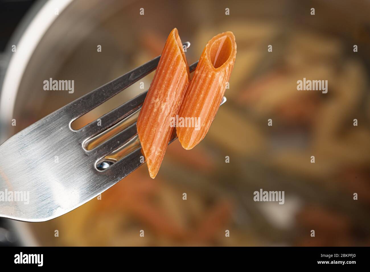 Cooking pasta at home in a pot close up Stock Photo - Alamy