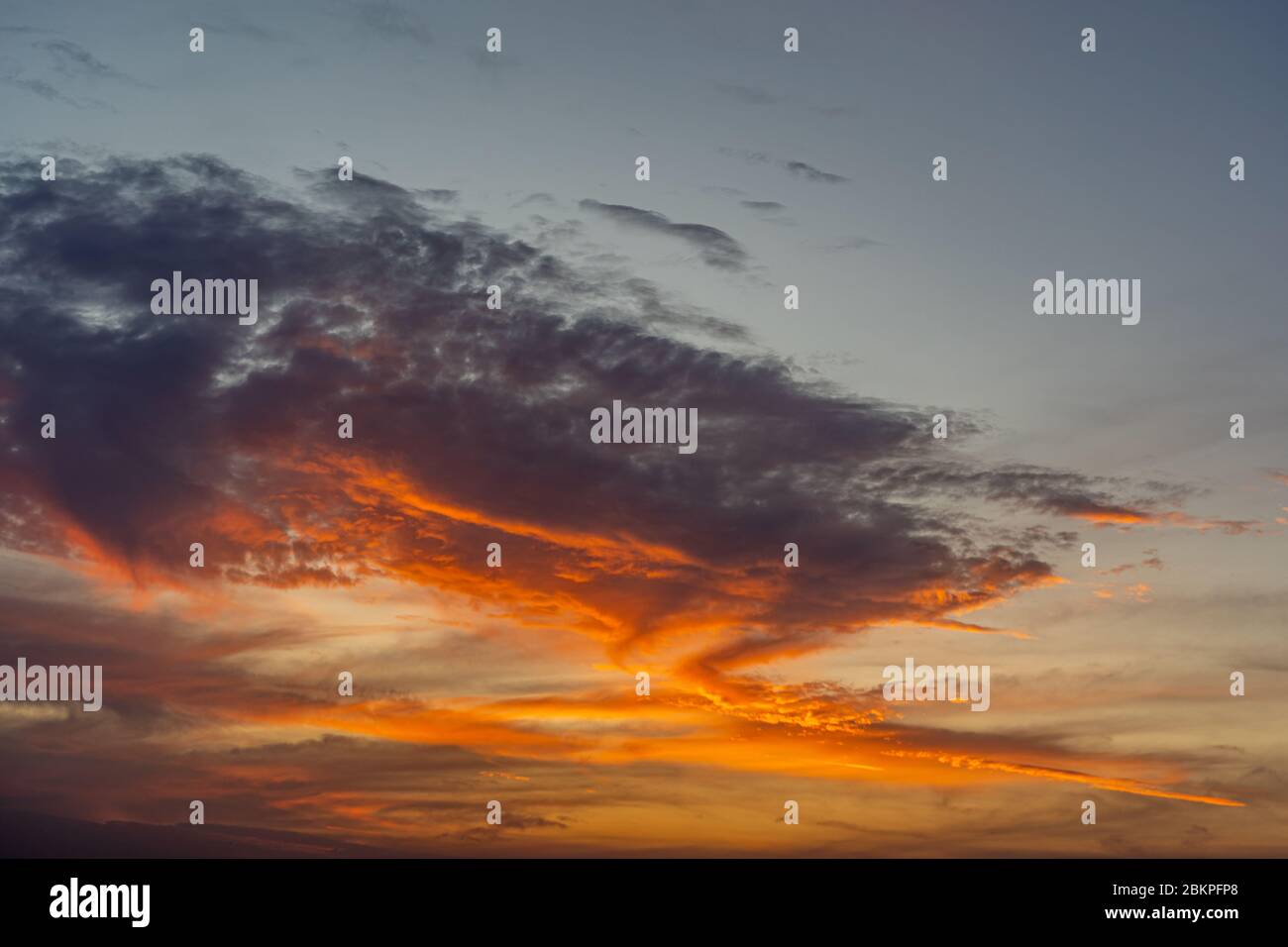 Dramatic orange twilight sky for nature background Stock Photo - Alamy