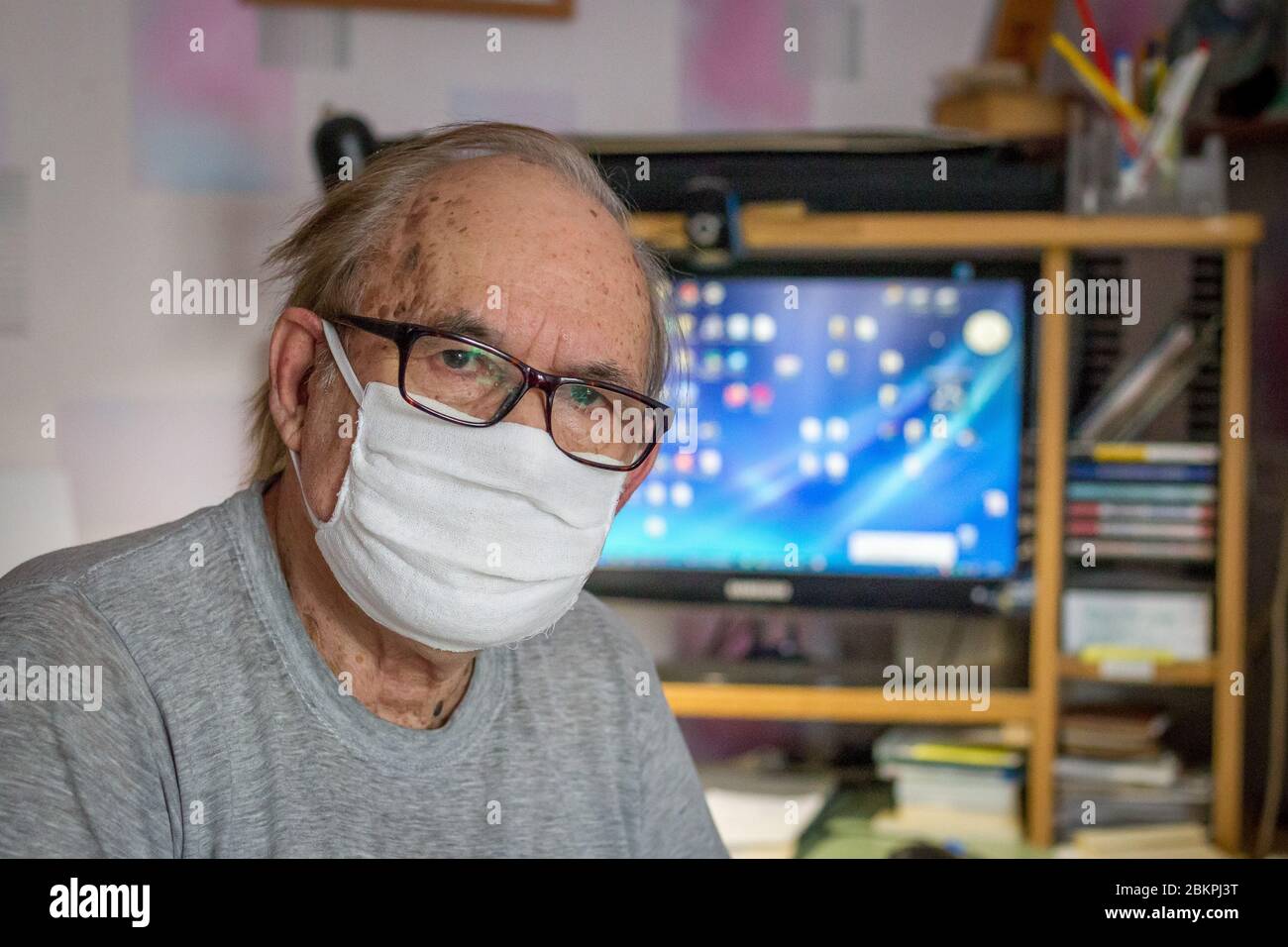 Elderly man at home isolation Stock Photo - Alamy