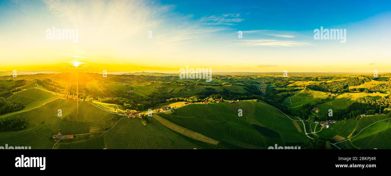 Gorgeous sunset over beautiful green vineyards. Aerial panorama sunset ...