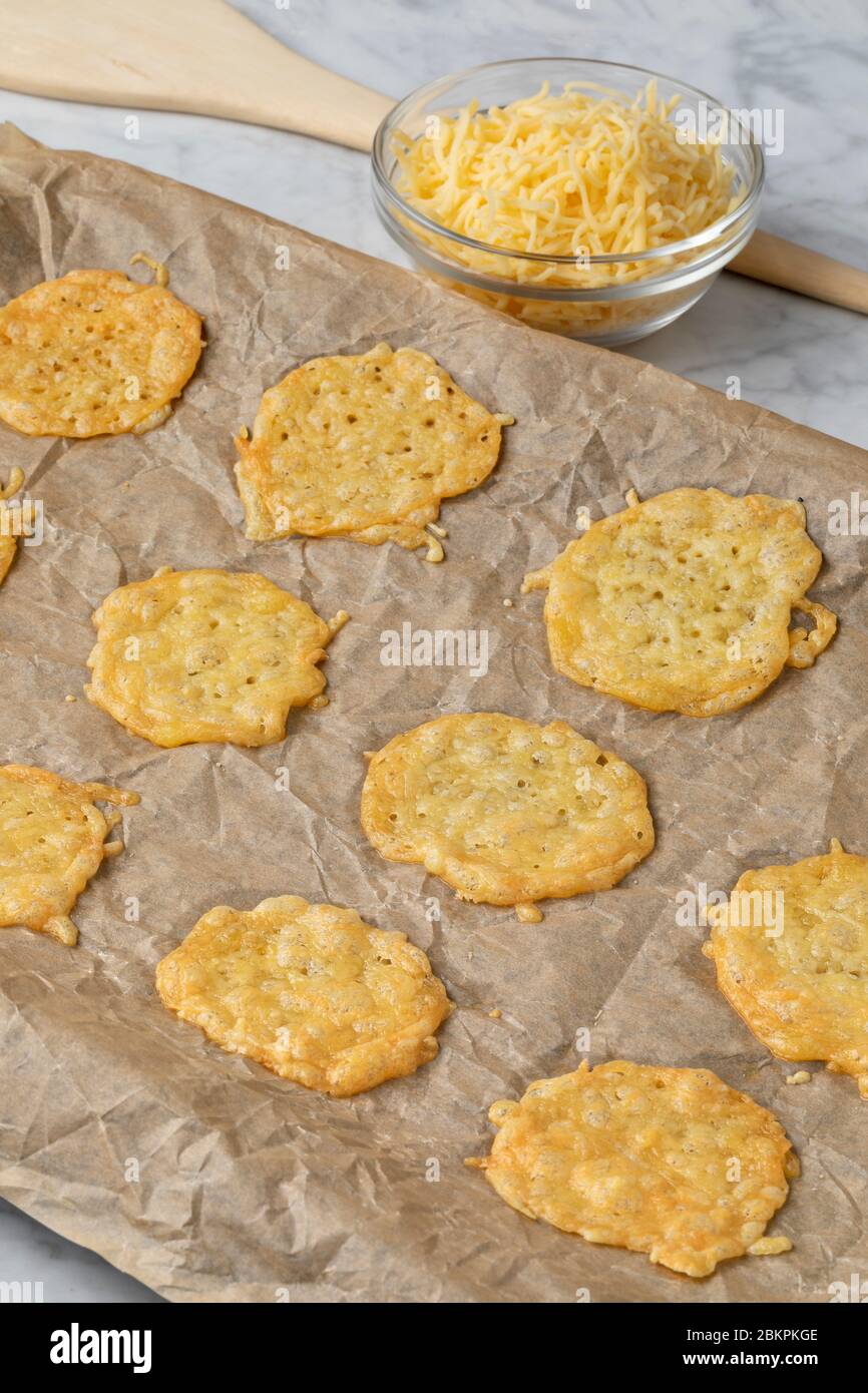 Baked homemade Dutch golden Gouda cheese cookies close up Stock Photo ...