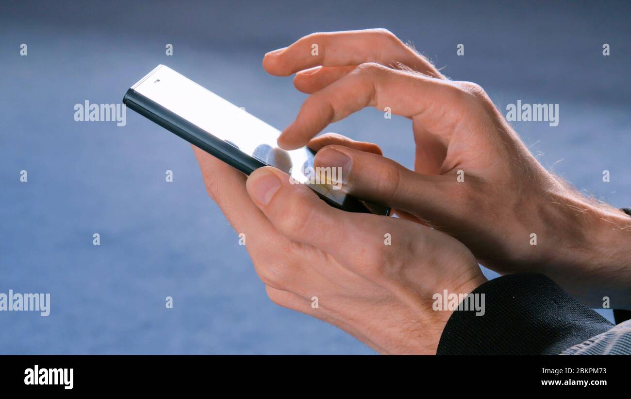 Male scroll hi-res stock photography and images - Alamy