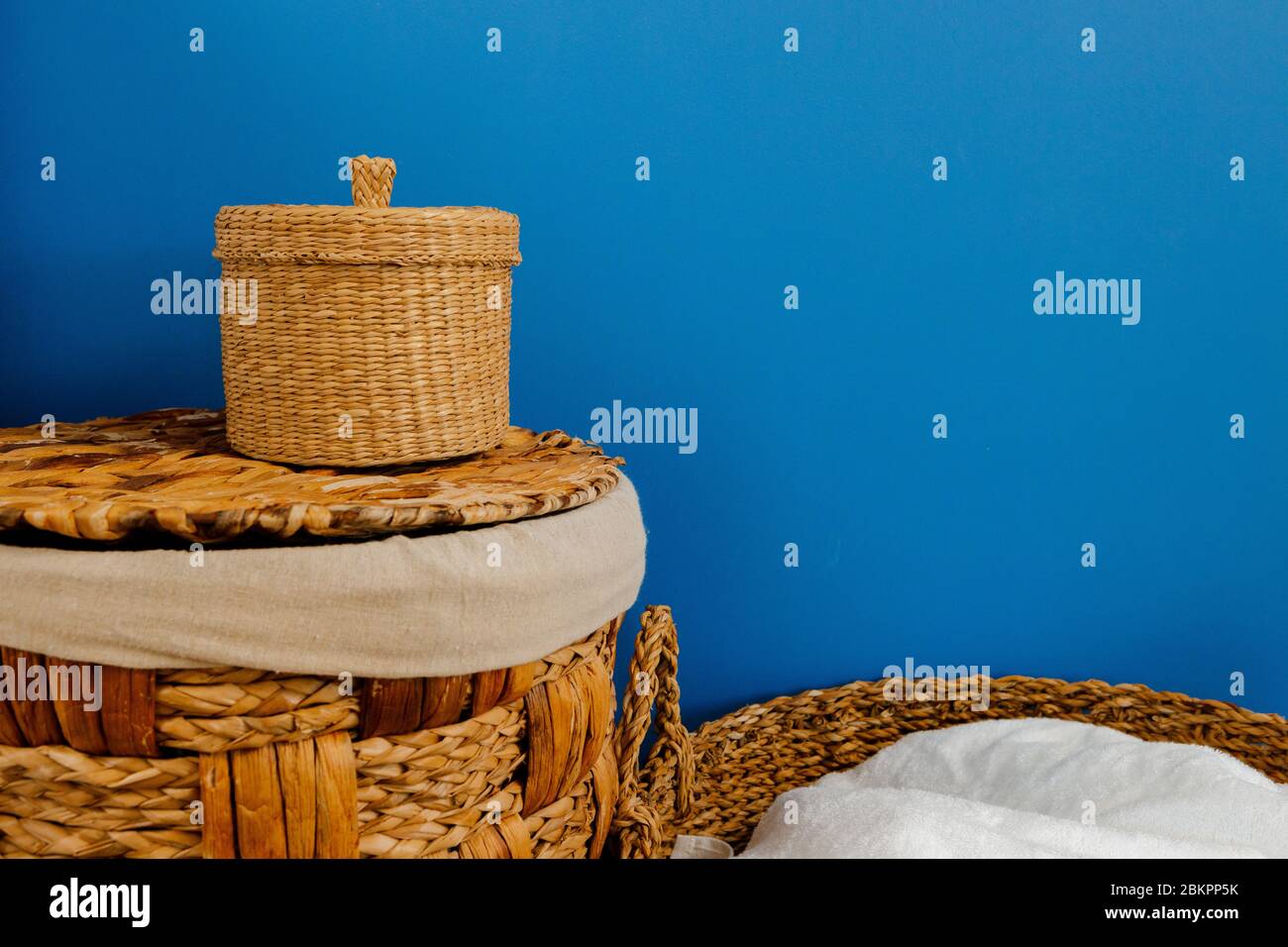 Pile of clothes in laundry basket indoors Stock Photo - Alamy