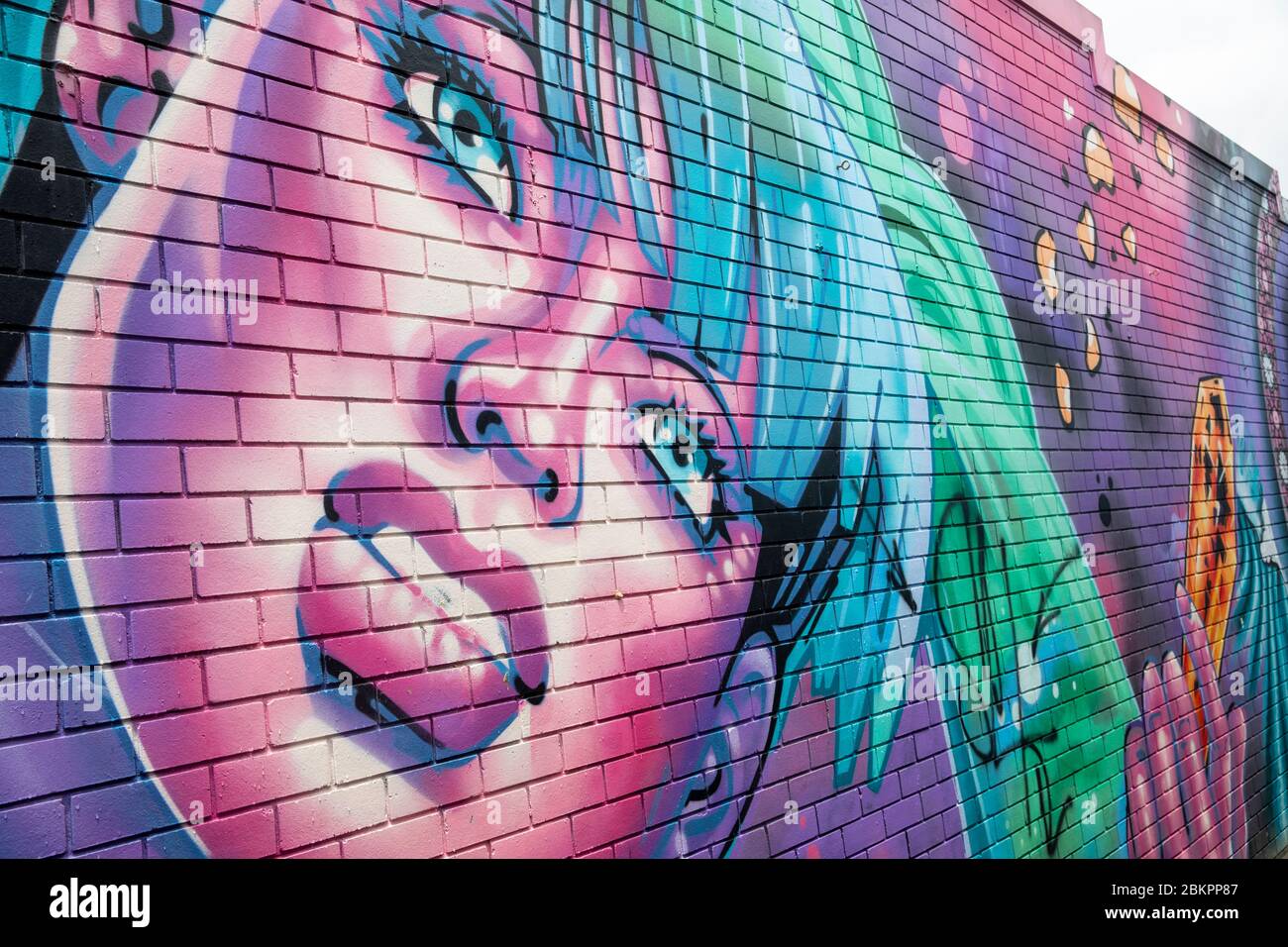 Byron Bay town centre mural artwork on a brick wall in an alley way,NSW ...