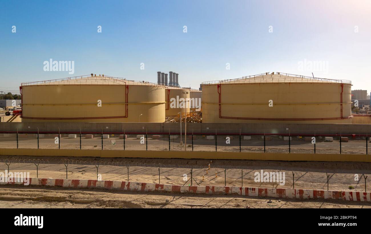 The territory of the oil refinery. Metal containers for storing oil and ...