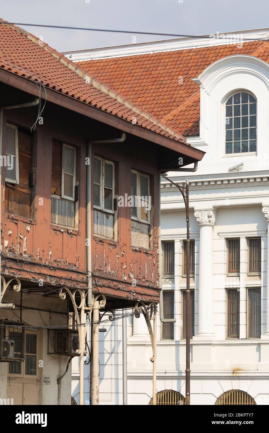 Close-up of the facade of some old colonial buildings, in the Kota Tua ...