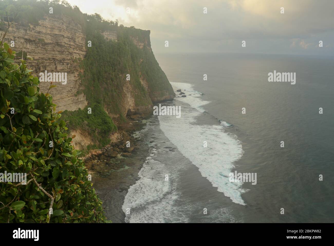 Overview panorama ocean shore, cliff. Sunset. Bali. Overwhelmed scene ...